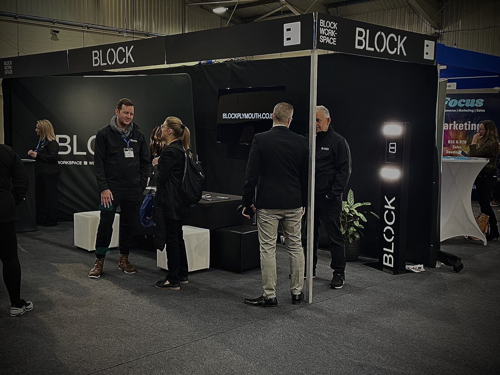 How a branded photo booth can make your next trade show stand a success