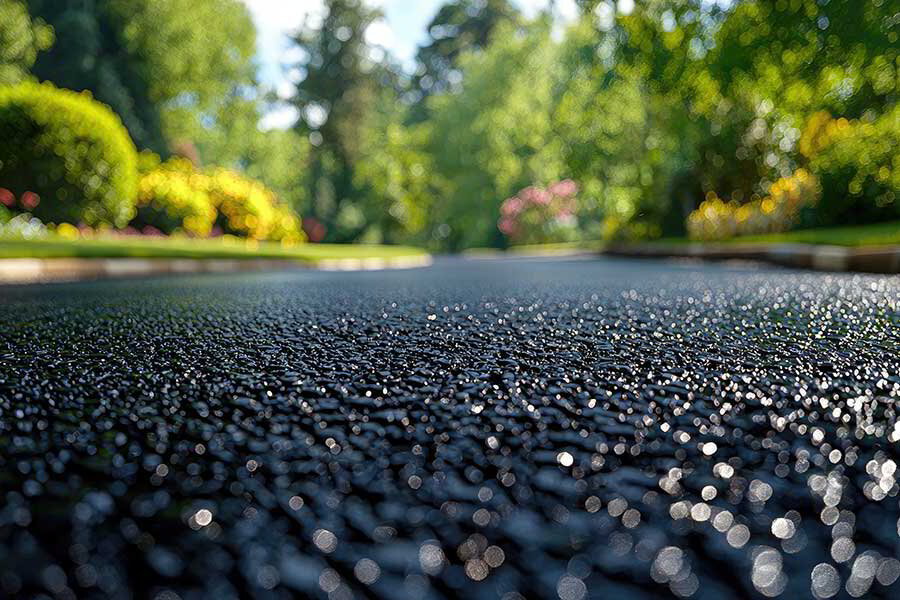 The Benefits of Sealcoating for Your Asphalt Surfaces