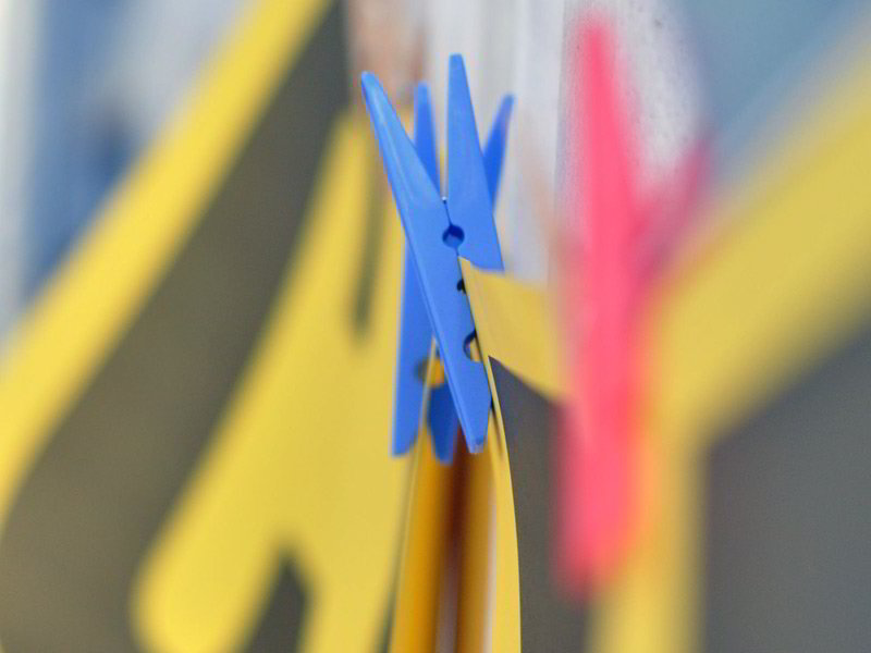 Hang your sign with pegs and string